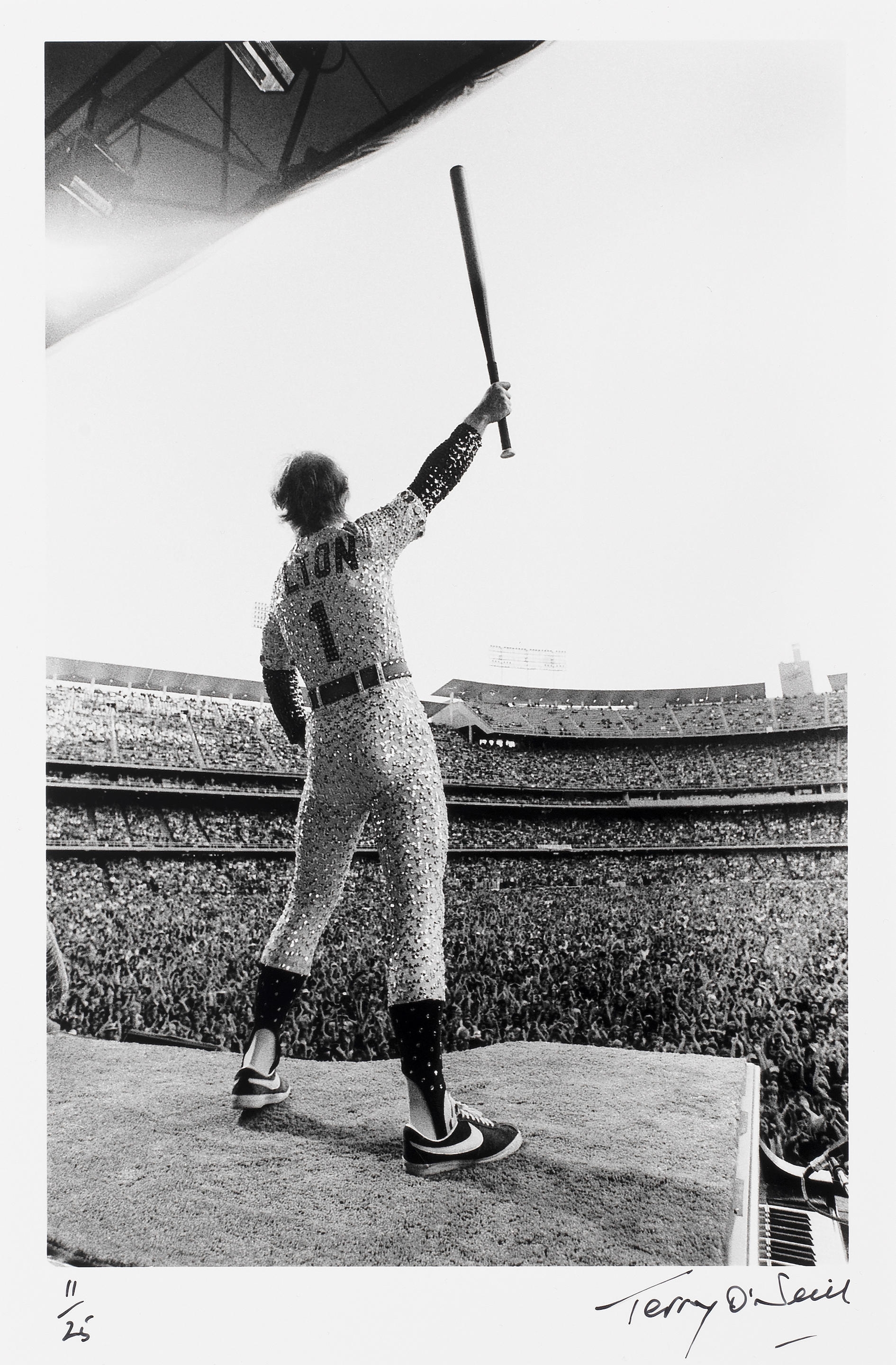 Terry O'Neill | Elton John, Dodgers Stadium (1975) | MutualArt