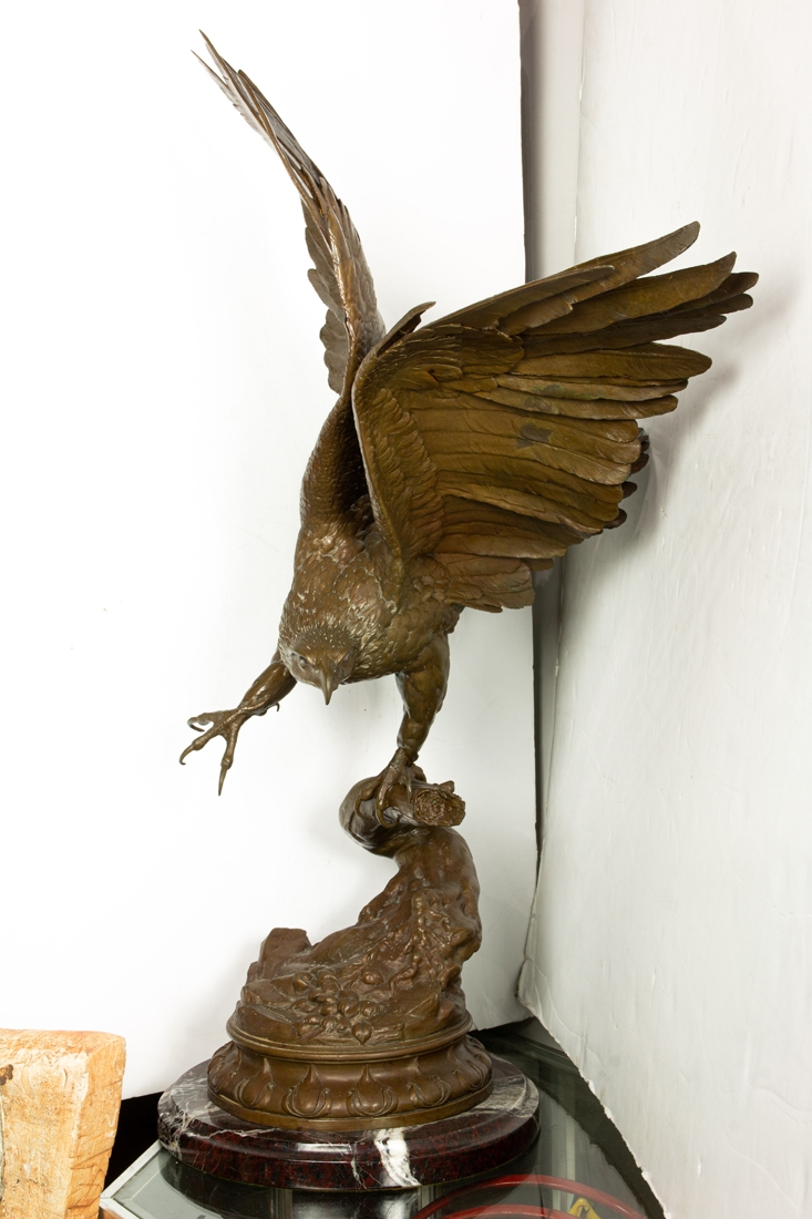 Jules Moigniez | A Continental patinated bronze model of an eagle after ...