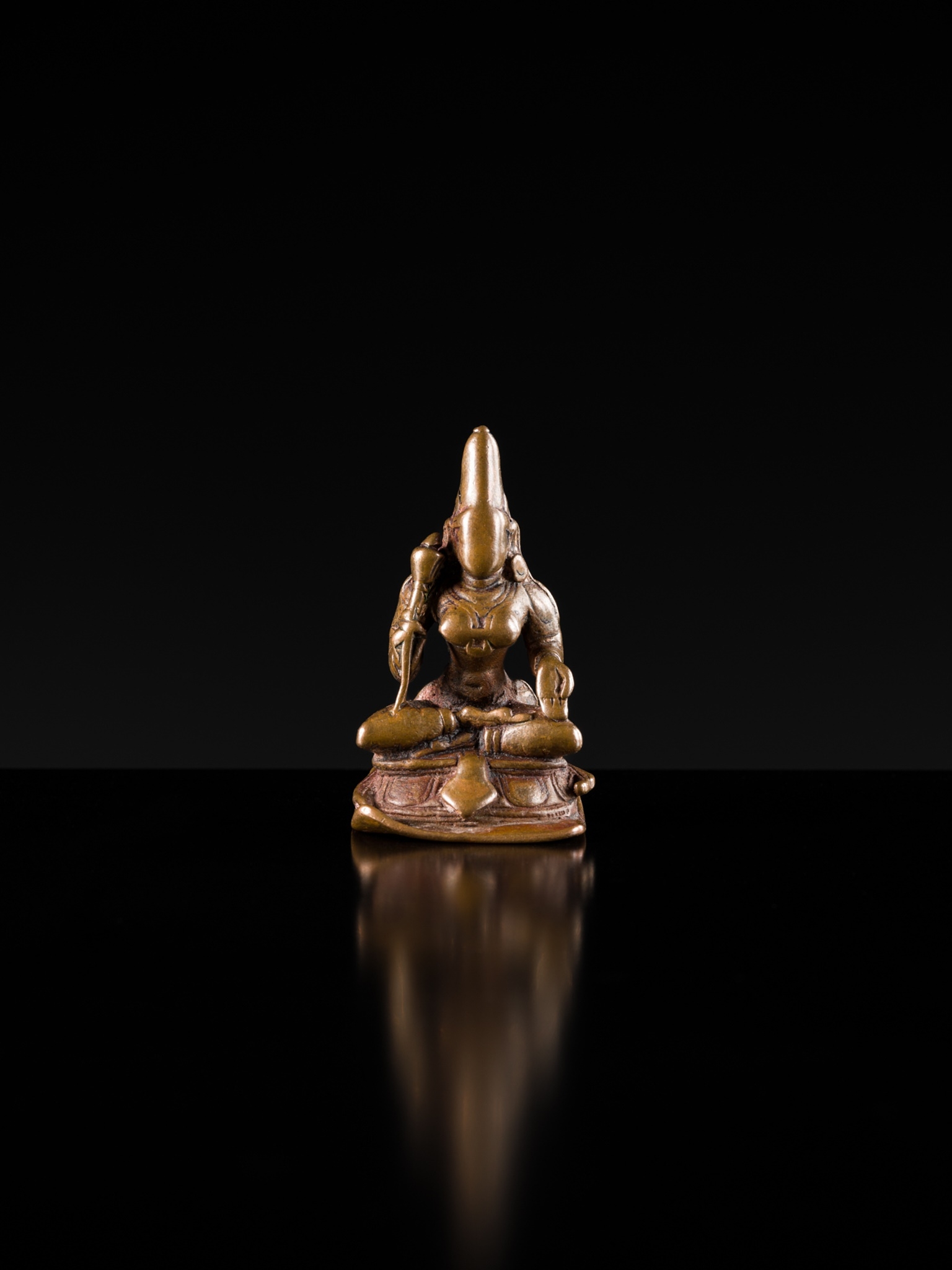 South Indian School, 17th Century | A SMALL BRONZE FIGURE OF SRI DEVI ...
