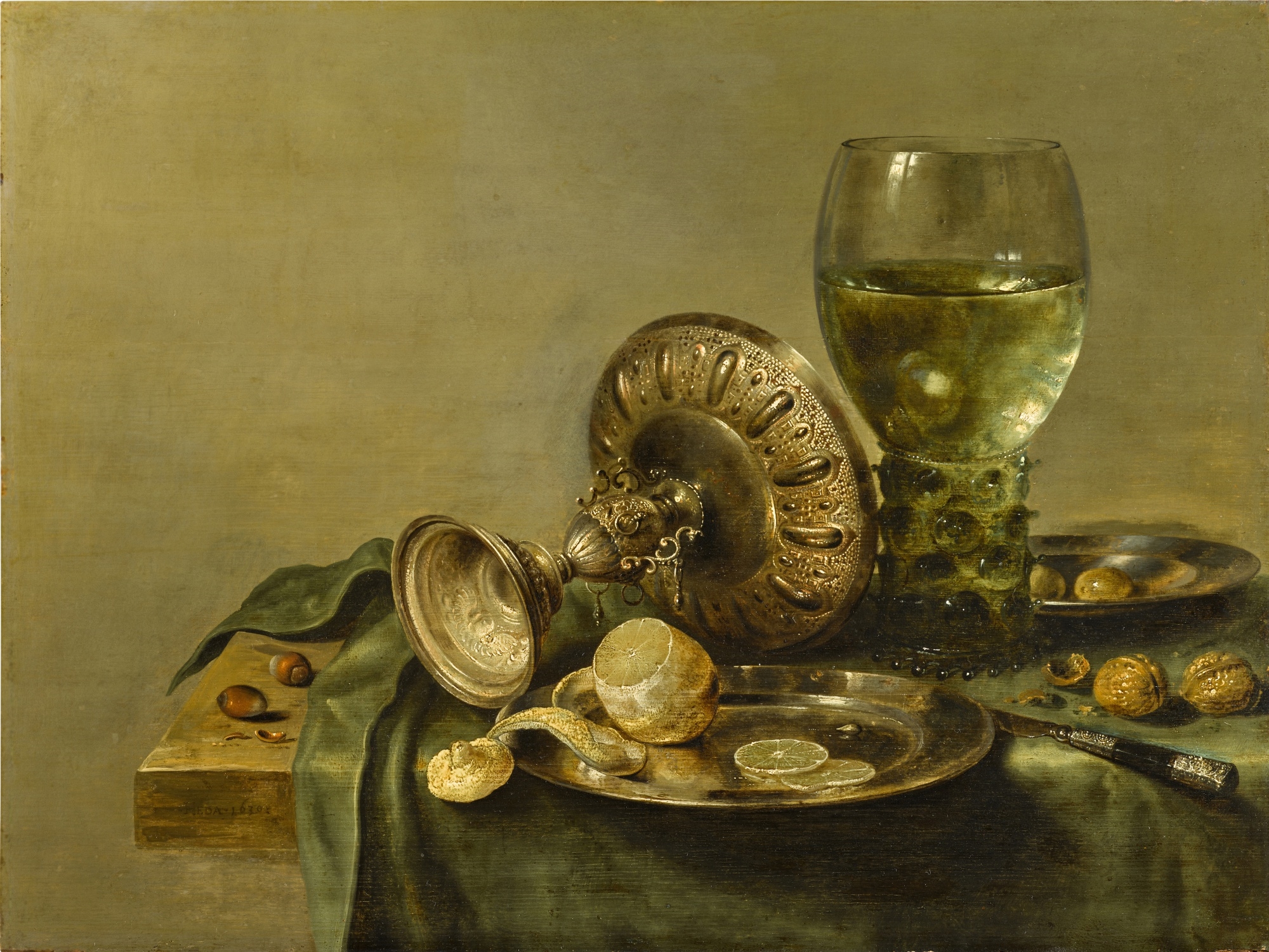 Willem Claesz. Heda | Still life with a roemer, an upturned tazza, nuts ...