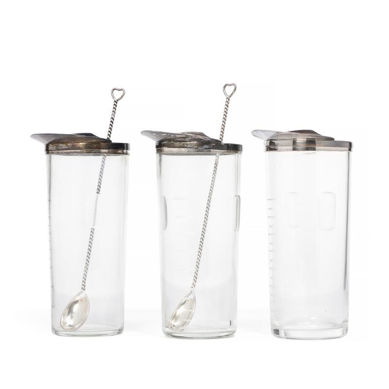 Ole Hagen | Three clear glass cocktail pitchers with sterling silver ...