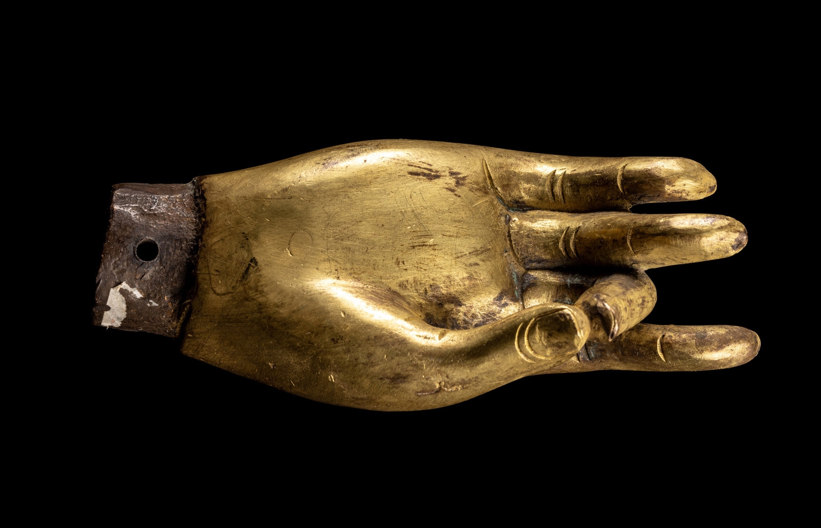 Chinese School | A Chinese Gilt Bronze Hand of Buddha | MutualArt