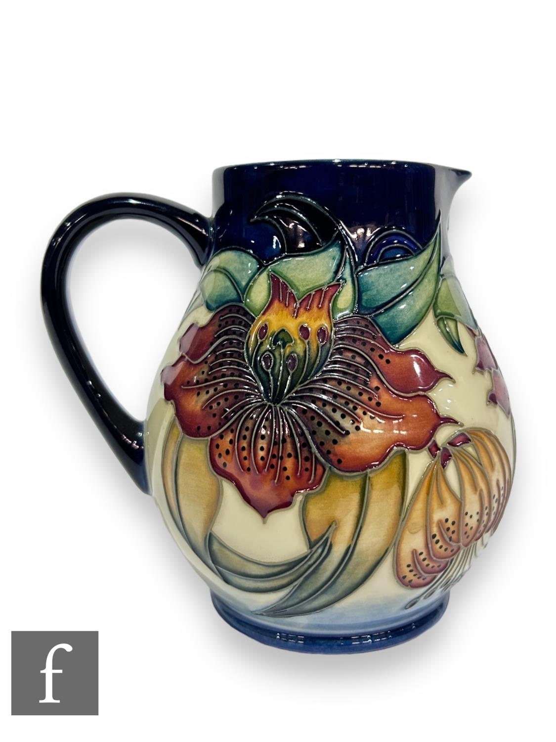 William Moorcroft | A contemporary Moorcroft Pottery jug of footed ...