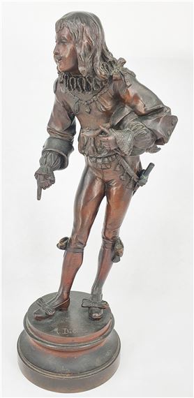 Marcel Debut | a bronze figure of a young prince holding a slipper ...