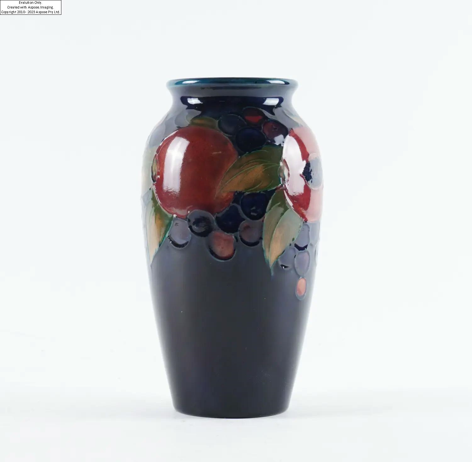 William Moorcroft | A MOORCROFT SLENDER OVOID VASE (Circa 1930) | MutualArt