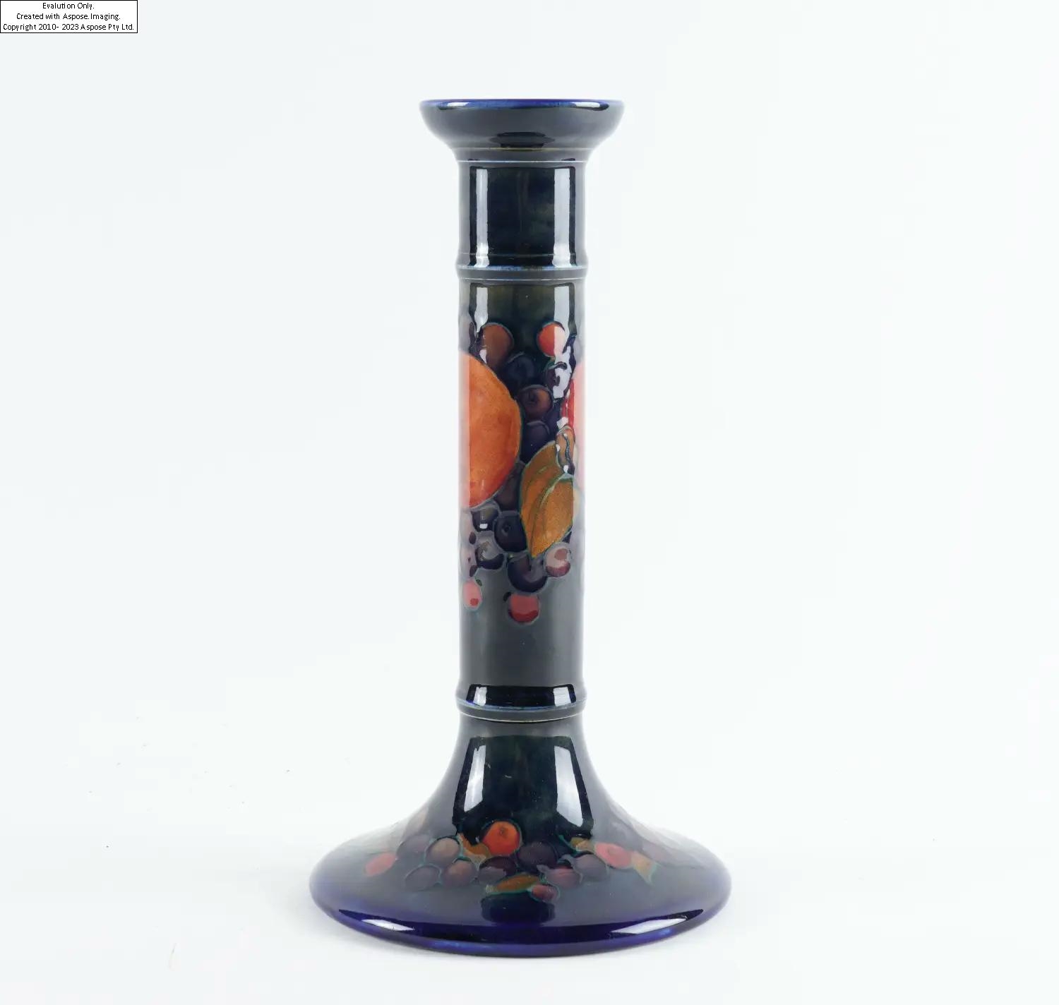 William Moorcroft | A MOORCROFT POTTERY CANDLESTICK (1920) | MutualArt