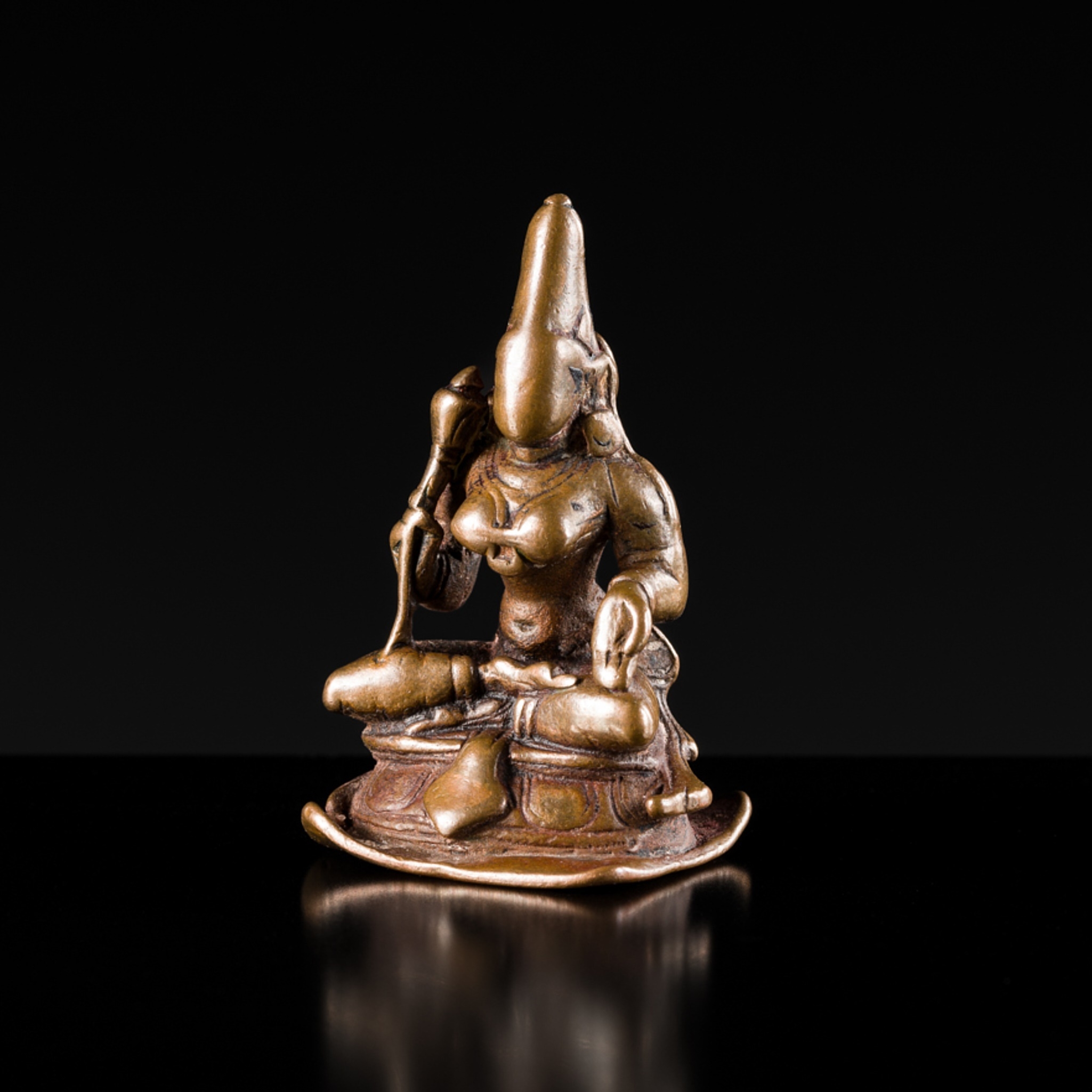 South Indian School, 17th Century | A SMALL BRONZE FIGURE OF SRI DEVI ...