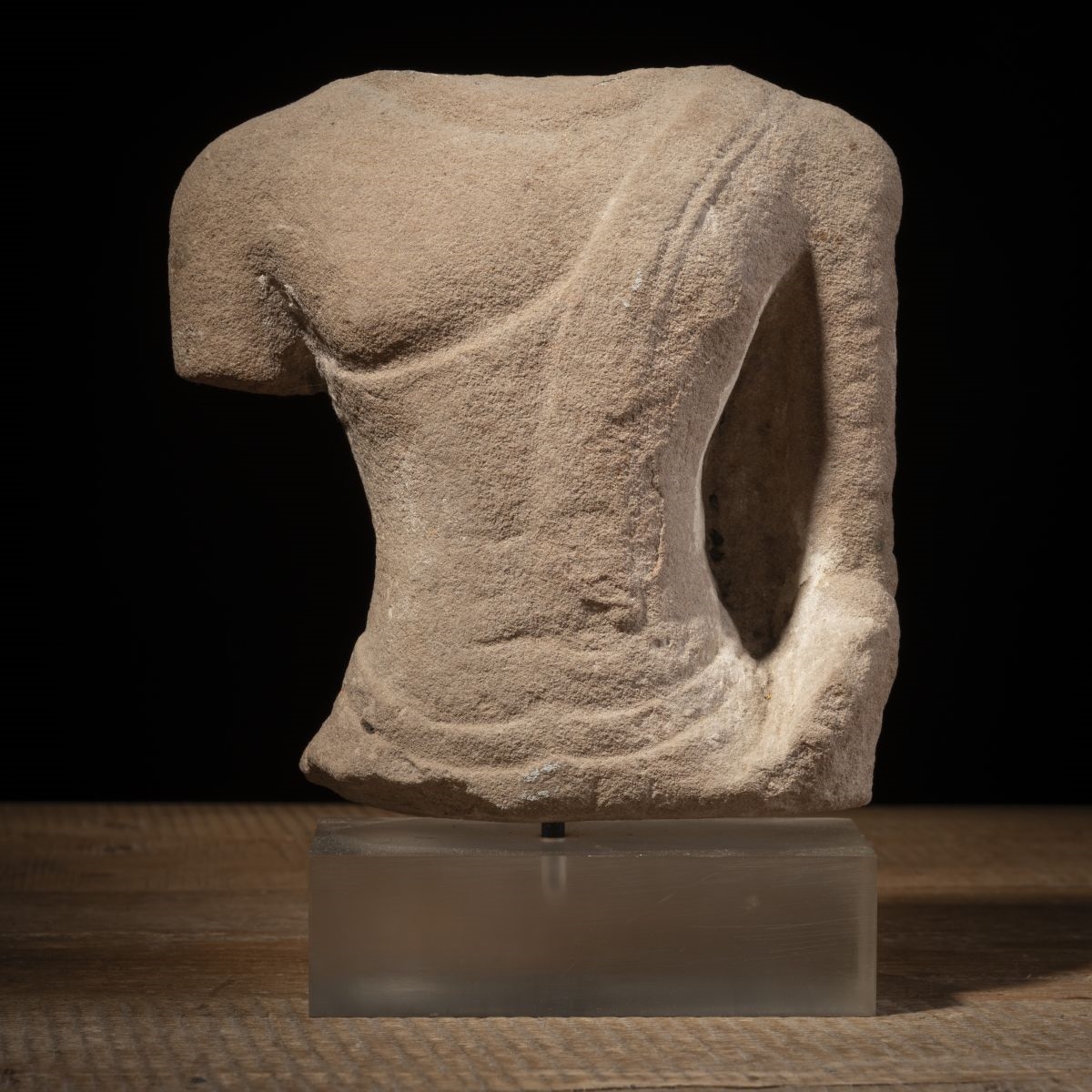 Thai School, 17th Century | A SANDSTONE TORSO OF BUDDHA (17) | MutualArt