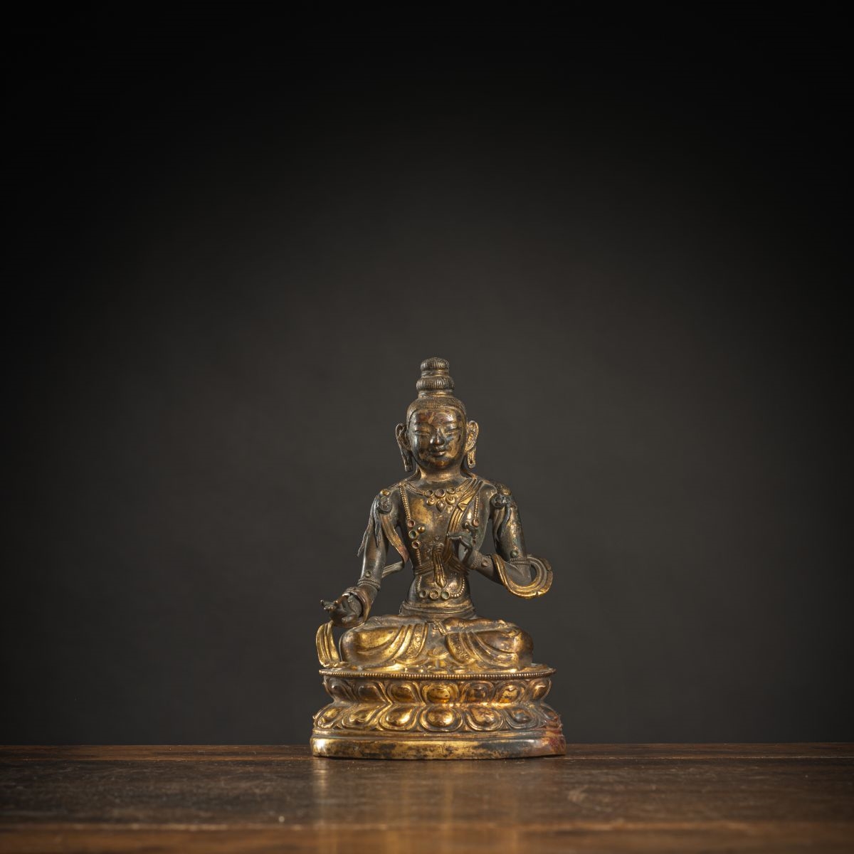 Sino-Tibetan School, 19th Century | A GILT-COPPER EMBOSSED FIGURE OF A ...