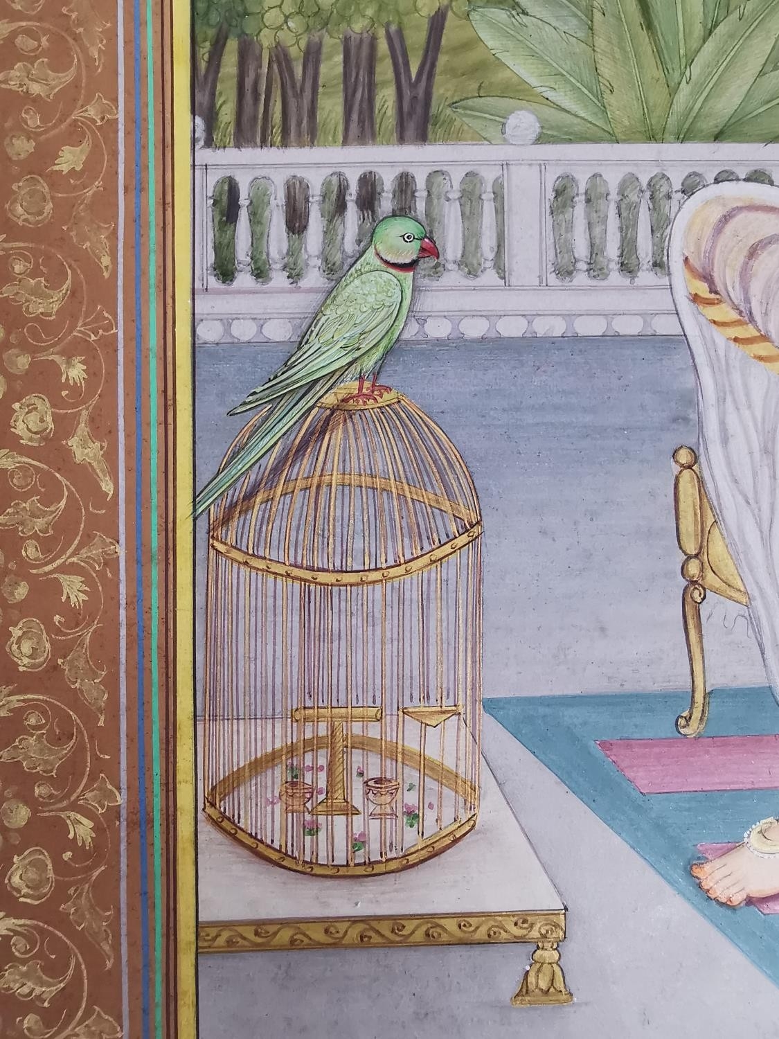 Mughal School | female in traditional Indian staring at a green parrot ...