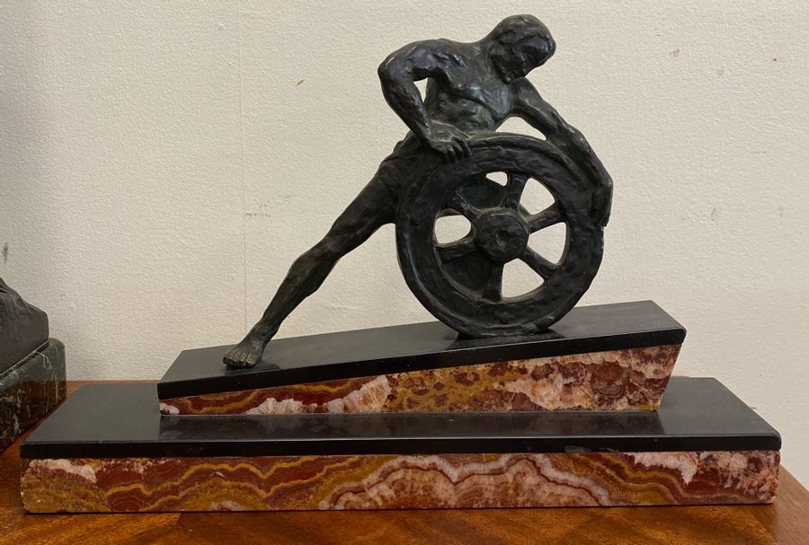 Michel Decoux | Homme à la roue Bronze | MutualArt