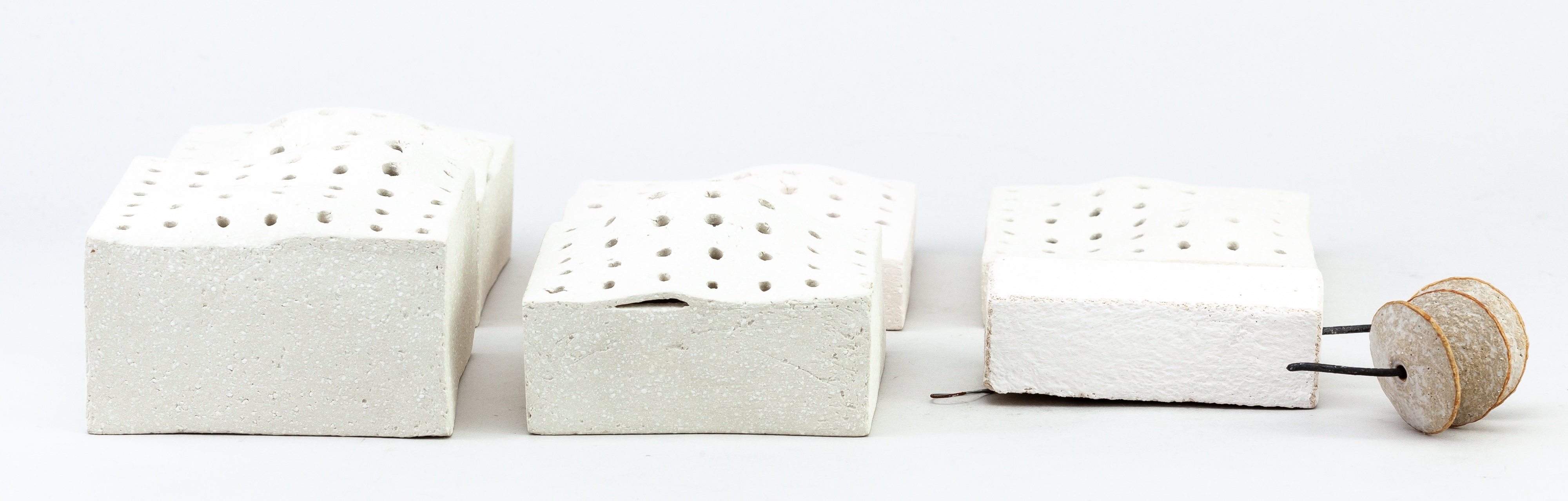Martin Pearce | five square perforated stoneware wall pieces | MutualArt