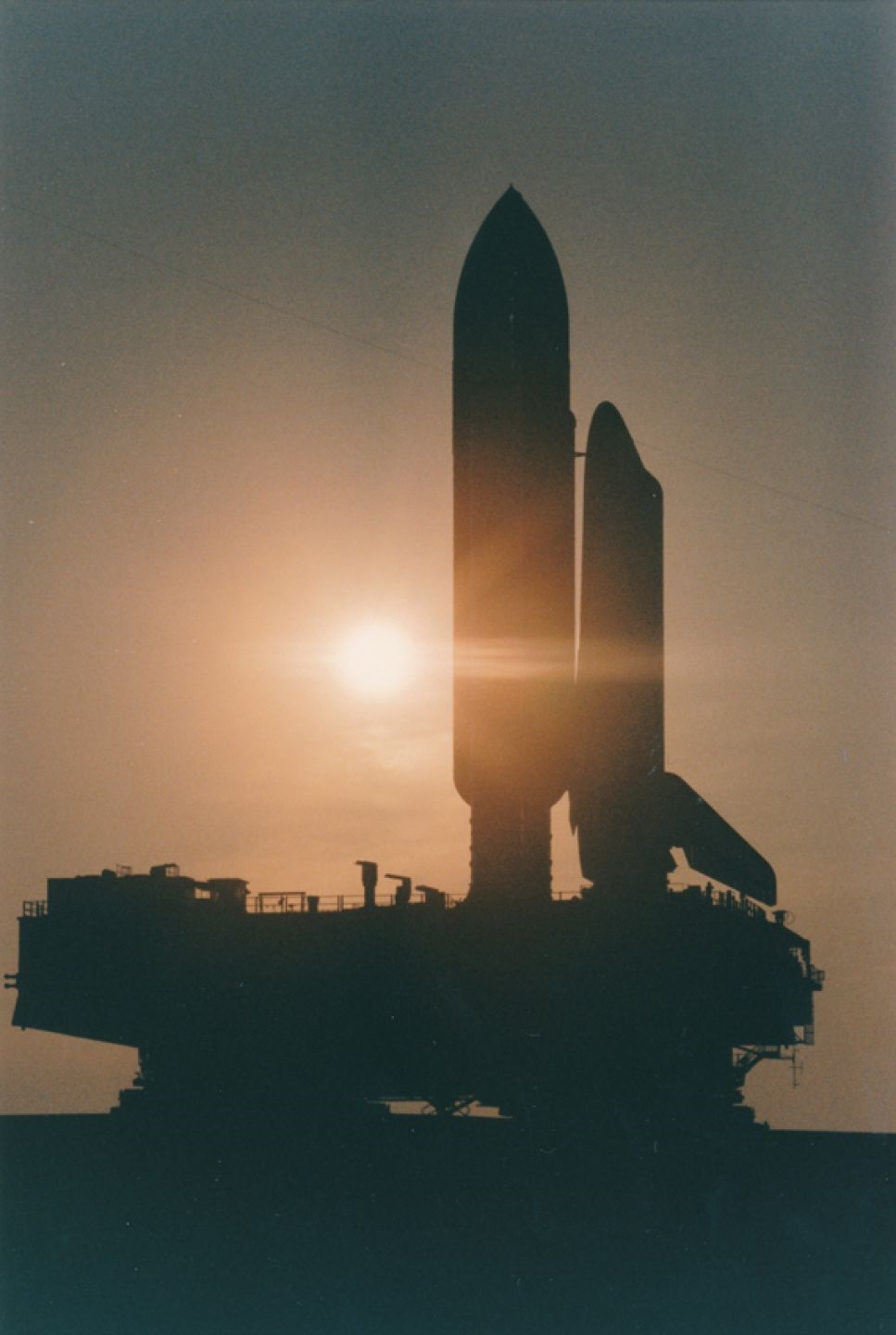 NASA | Nasa. Majestic silhouette of Space Shuttle Atlantis (Mission STS-84) caught in the ...
