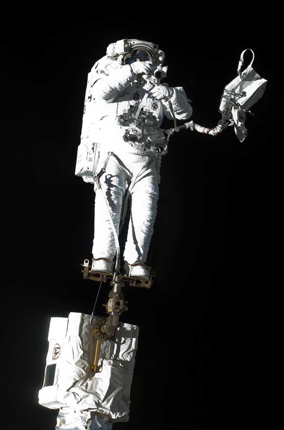 NASA | Nasa. EVA in Earth orbit. Anchored to a Canadarm2 mobile foot ...