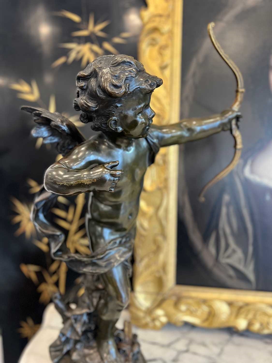Auguste Moreau | A LARGE BRONZE FIGURE OF CUPID WITH HIS BOW | MutualArt