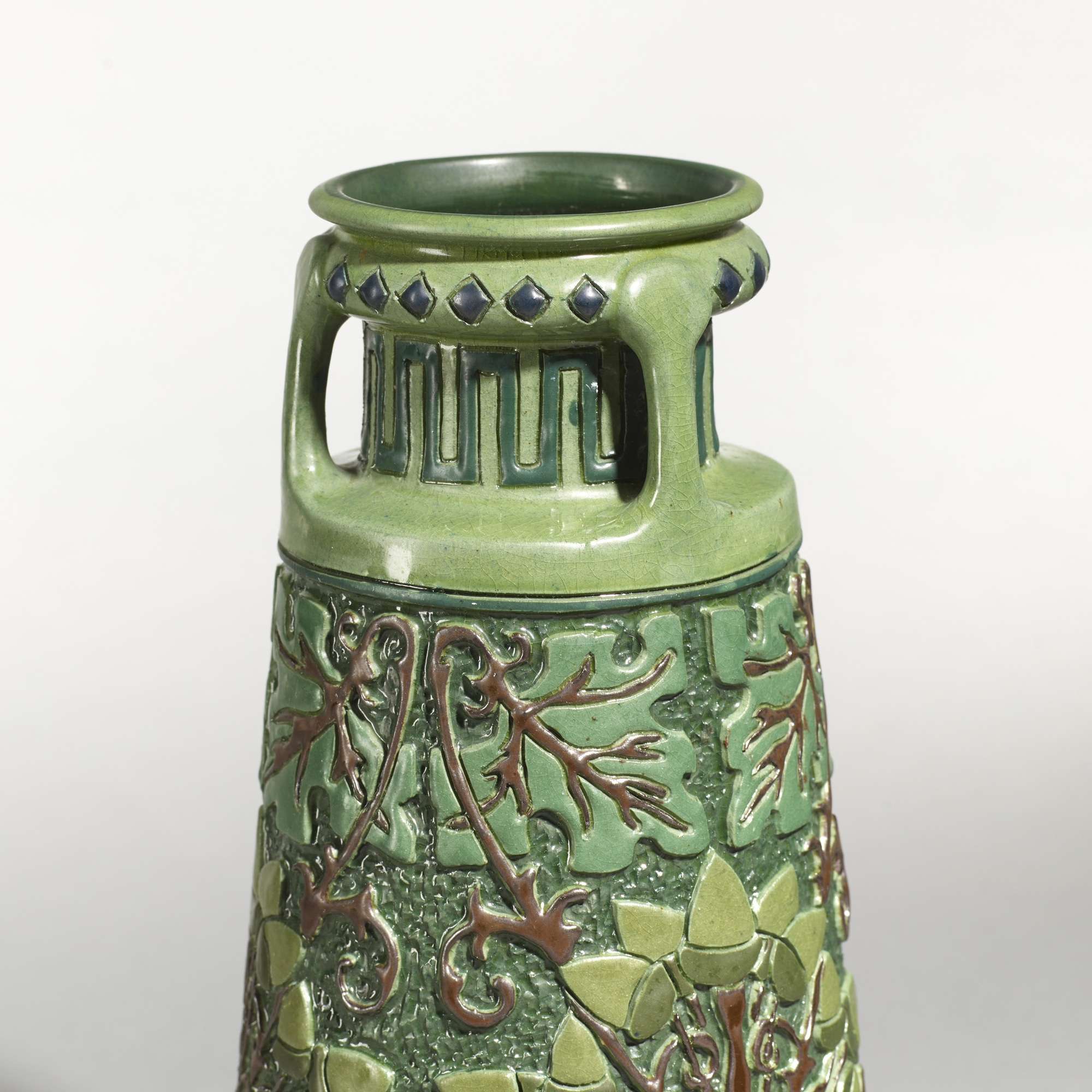 Frederick Hurten Rhead | Rare three-handled Della Robbia vase with oak ...