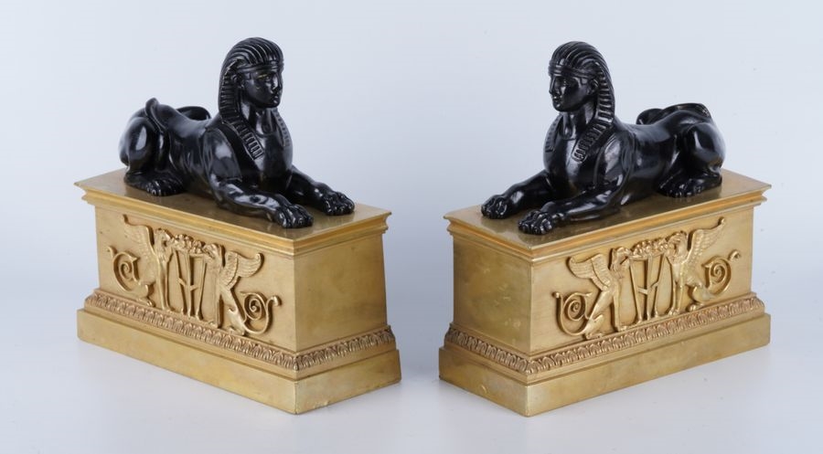 André Antoine Ravrio | Pair of bronze and brass andirons decorated with ...