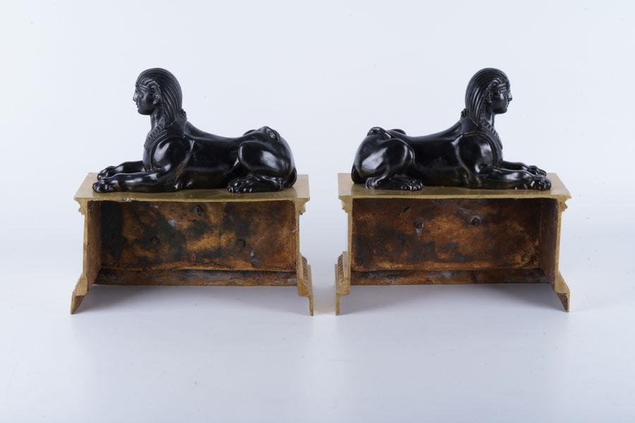 André Antoine Ravrio | Pair of bronze and brass andirons decorated with ...