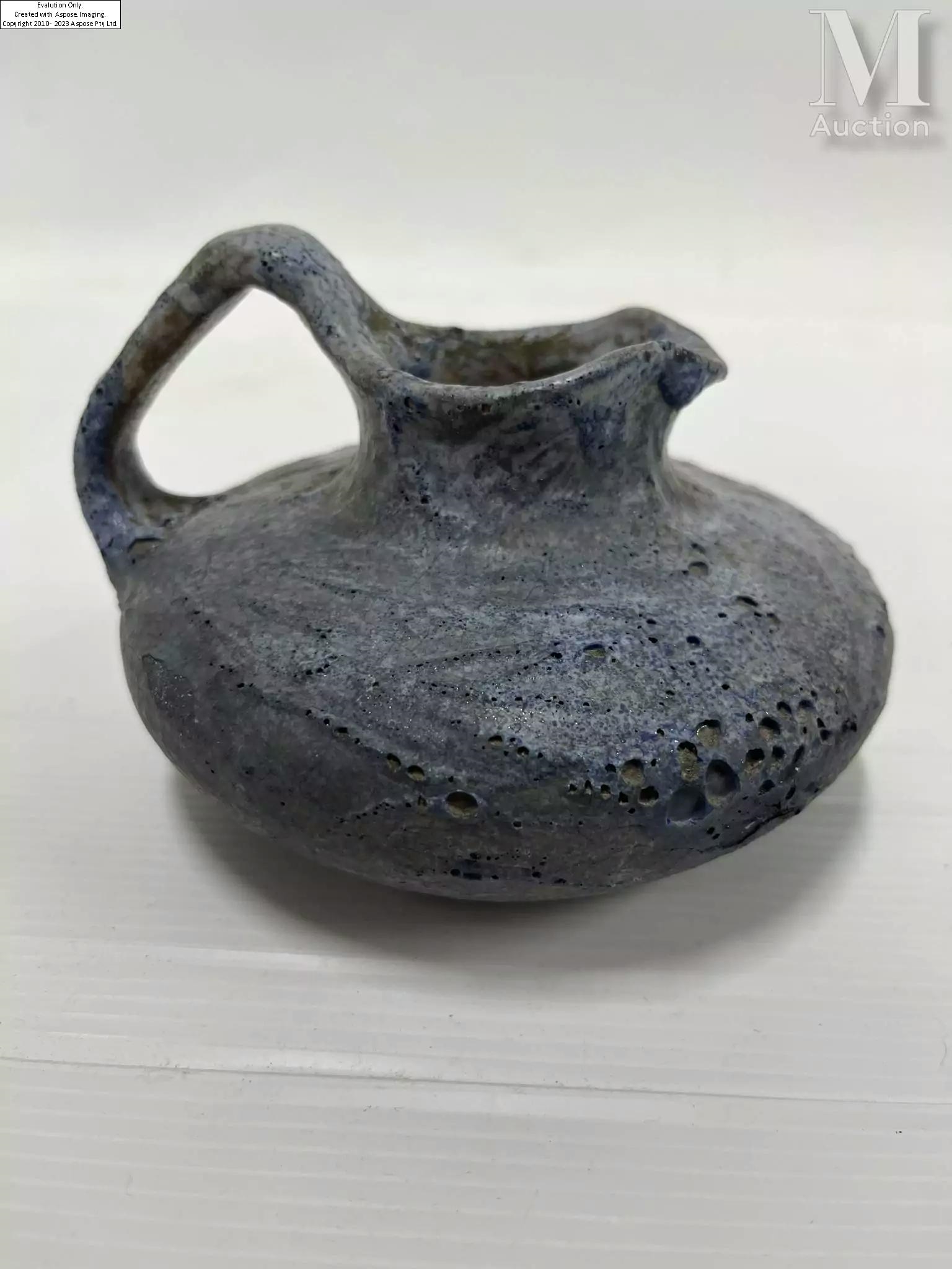 Edmond Lachenal | Pichet a anse en céramique émaillée gris | MutualArt