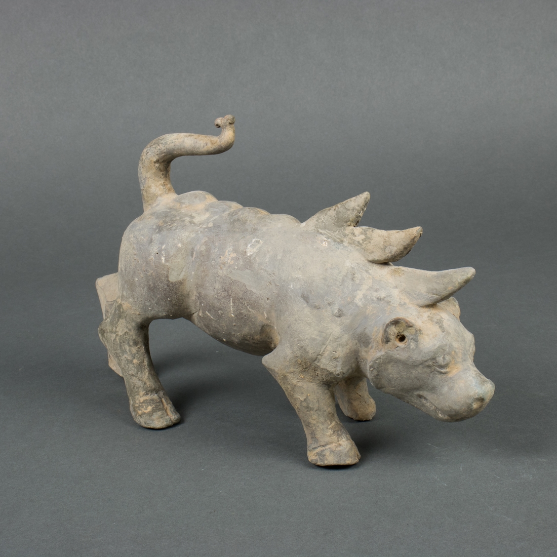 Chinese School | Chinese grey pottery model of a tricon. Han dynasty ...
