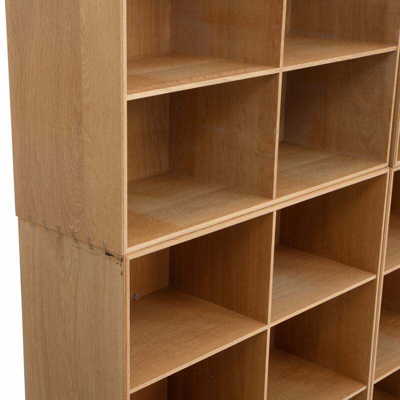 Mogens S. Koch | Solid oak wall unit consisting of eight bookcases and four plinths | MutualArt