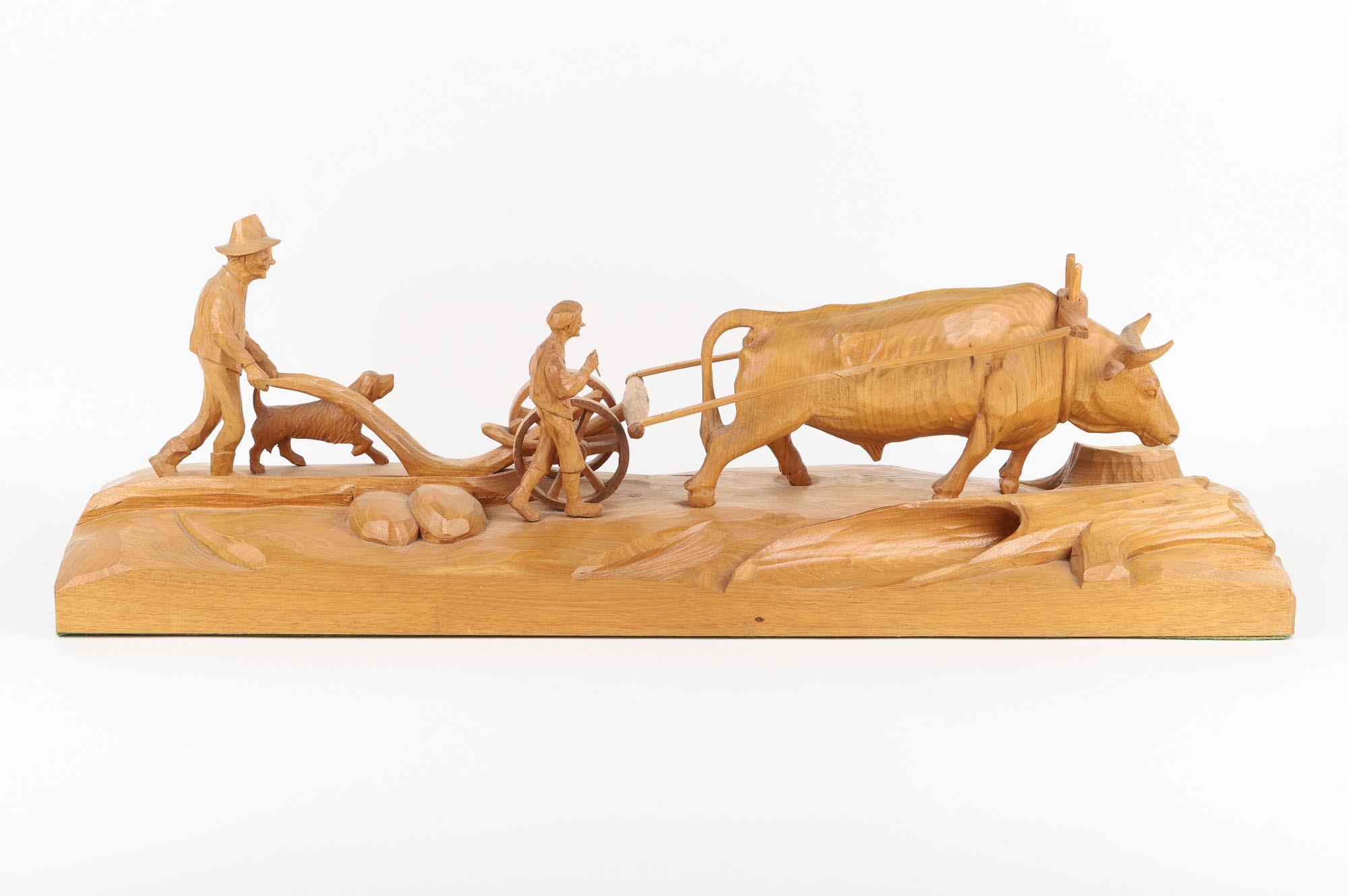 André Dubé | Andre Dubé carving of oxen with plow | MutualArt