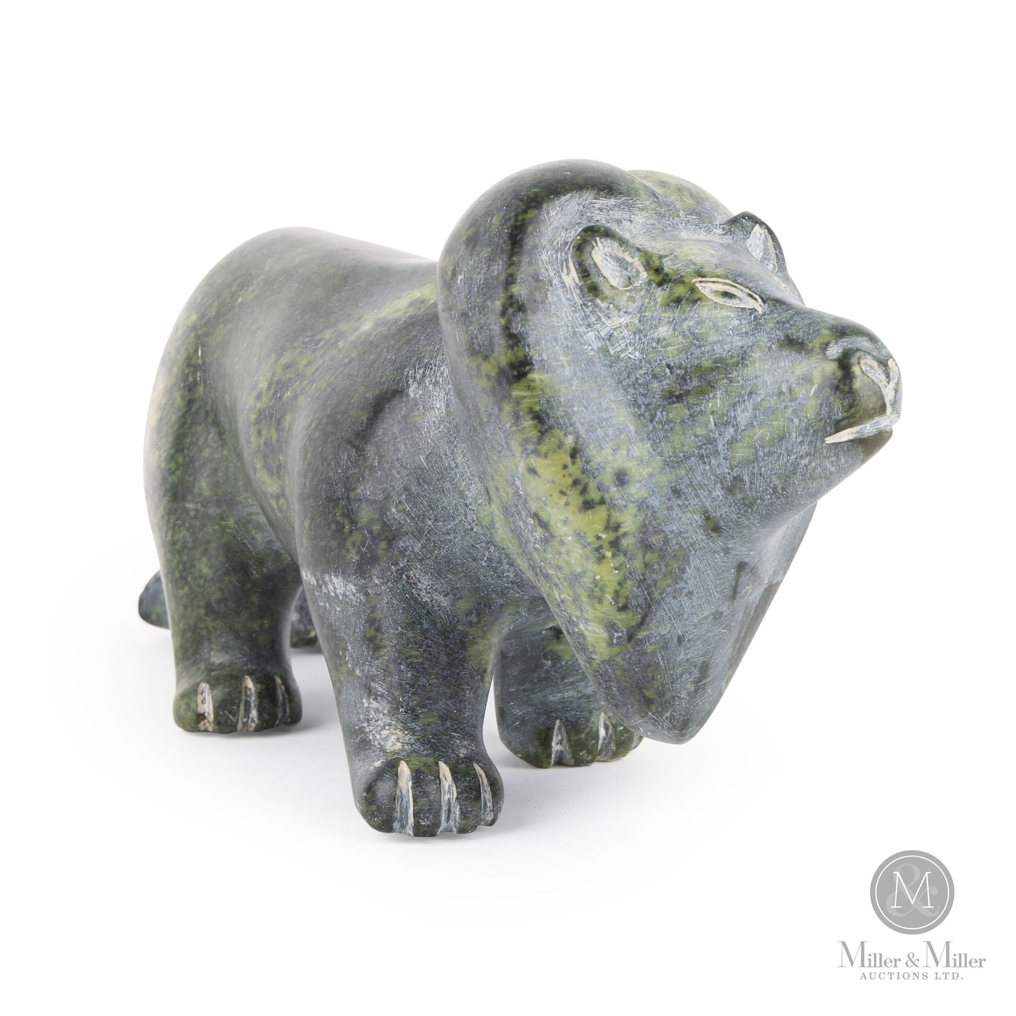 Kiawak Ashoona | 1960. A rare Inuit sculpture of a striding lion carved ...