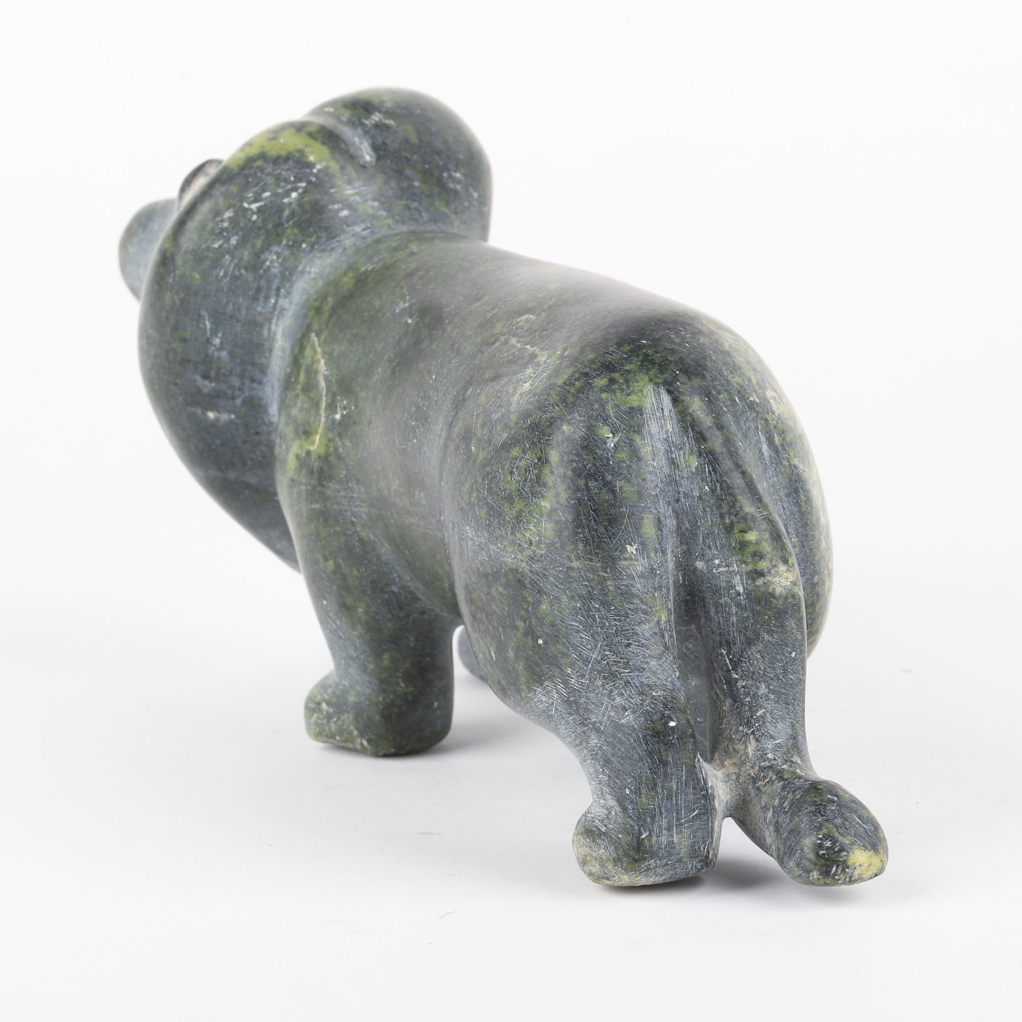 Kiawak Ashoona | 1960. A rare Inuit sculpture of a striding lion carved ...