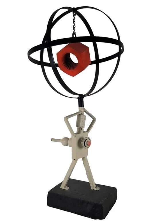 Edward Kolwicz | Brutalist style metal sculpture, a figure holding a ...