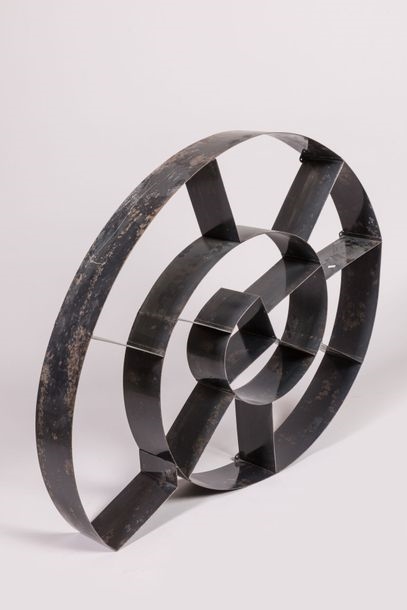 Ron Arad | Patinated metal snail-shaped wall bookcase (1980) | MutualArt
