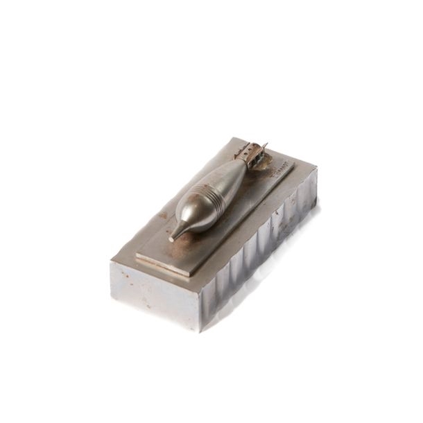 Edgar Brandt | . Steel paperweight surmounted by a shell on a ...
