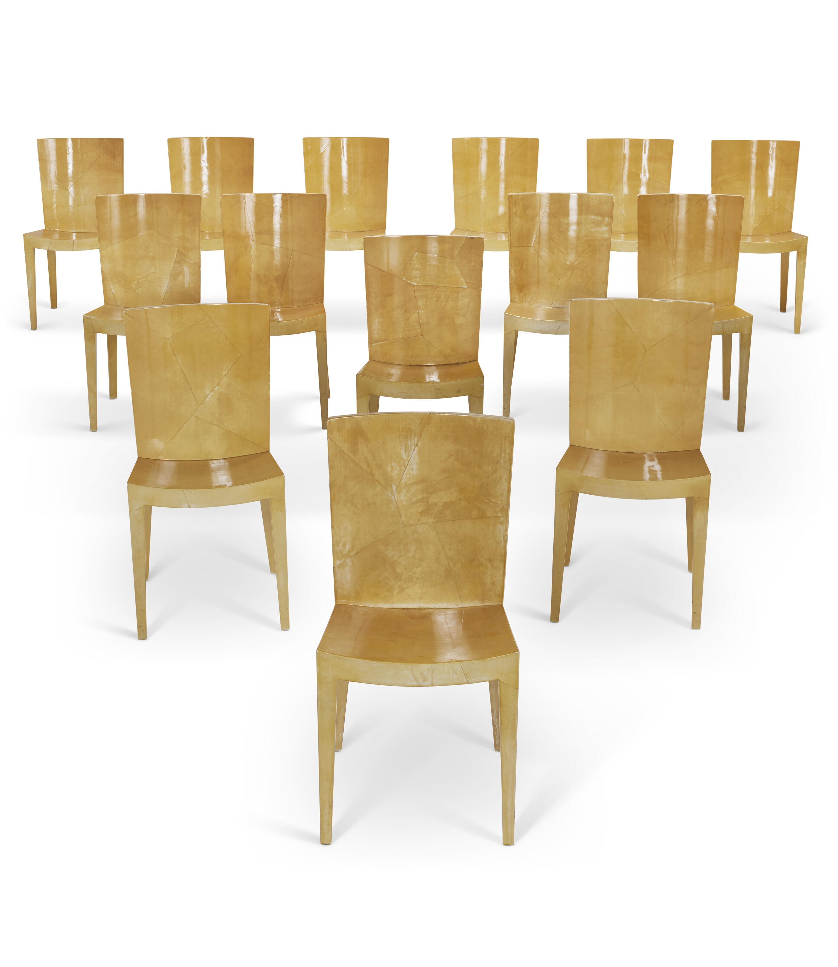 Karl Springer | SUITE DE QUATORZE CHAISES 'JMF', LE MODÈLE CRÉÉ | MutualArt