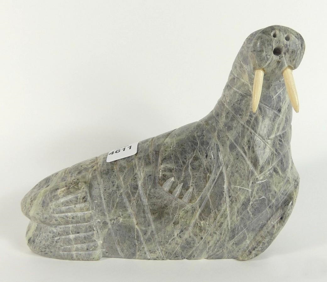 Etidlooie | Inuit stone carving in the form of a Walrus with ivory ...