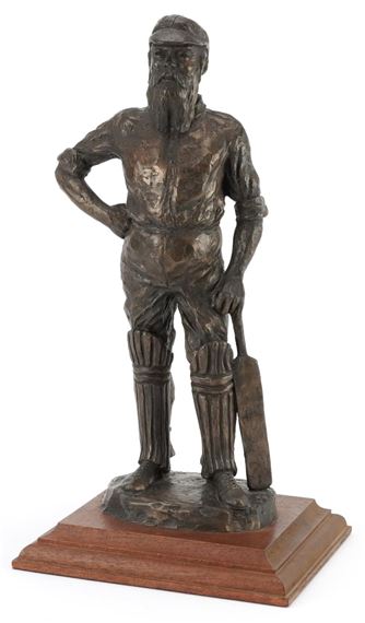 Neil Godfrey | cold cast bronze statue of a cricketer raised on a ...