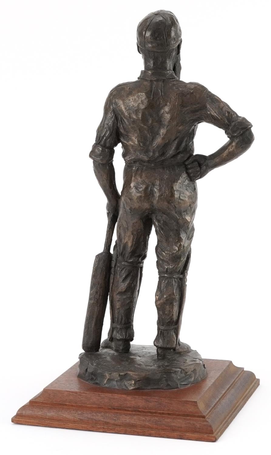 Neil Godfrey | cold cast bronze statue of a cricketer raised on a ...