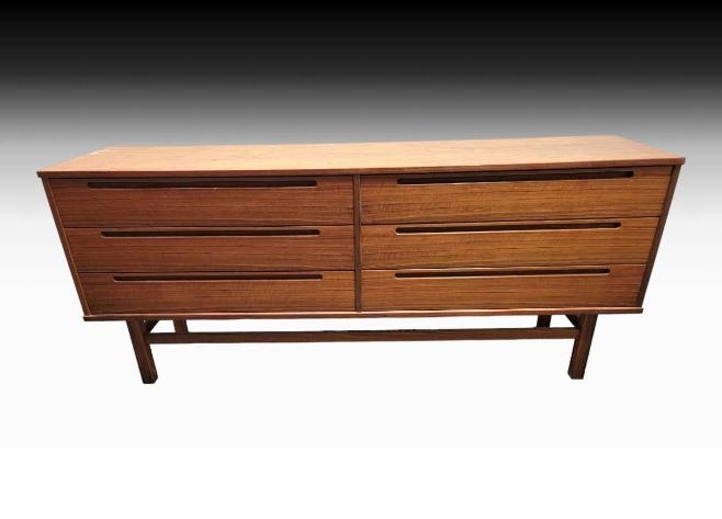 Nils Jonsson | A sleek Mid-Century six-drawer lowboy dresser on raised ...