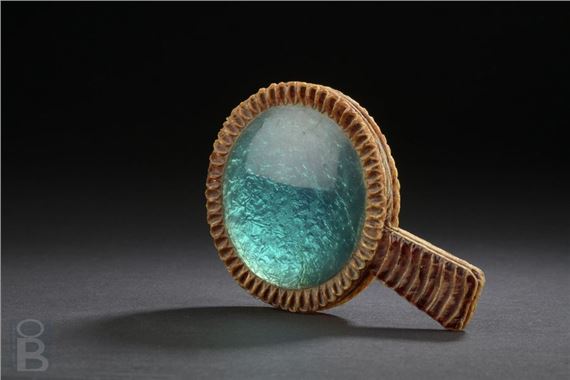 Line Vautrin | Circular hand face in a red-tinted talossel surround and ...