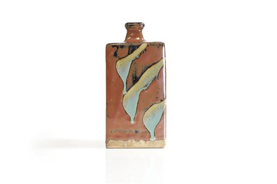 Shoji Hamada | a bottle vase of square shouldered form with a faceted ...