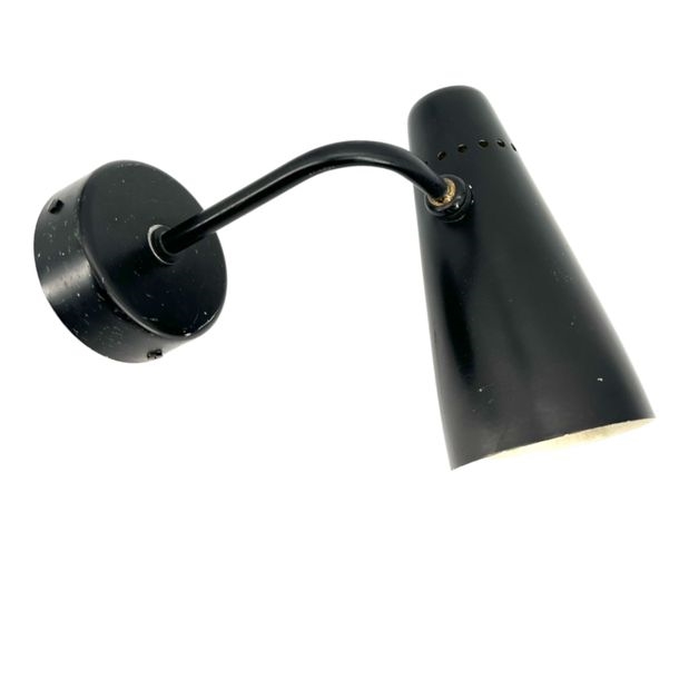 Pierre Guariche | Circular mounting plate, supporting a brass arm ...