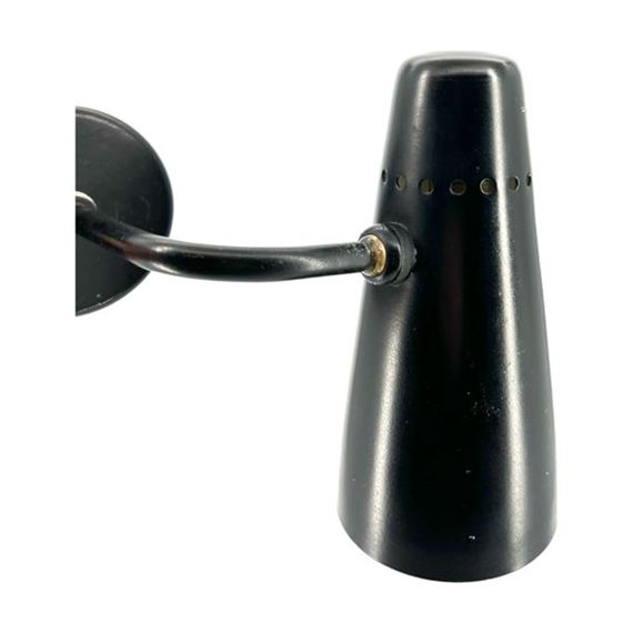 Pierre Guariche | Circular mounting plate, supporting a brass arm ...