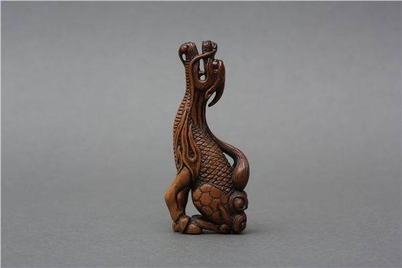 Tomotada | A JAPANESE BOXWOOD NETSUKE OF A MYTHICAL KIRIN (19th Century ...