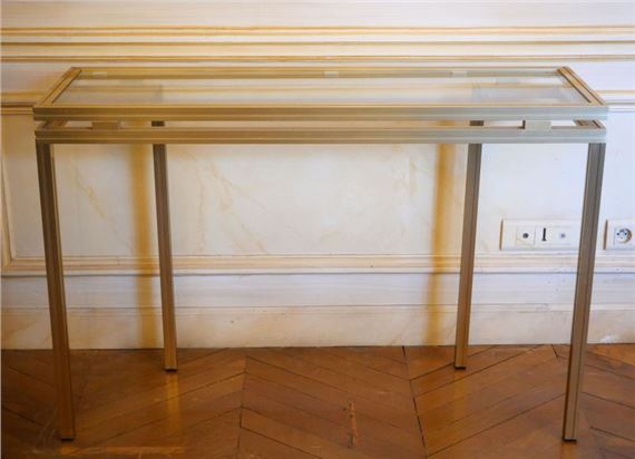 Pierre Vandel | Rectangular gilded metal console with glass top | MutualArt