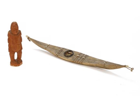 Pauline Alaufesen | Greenlandic kayak model and a carved wood figurine ...