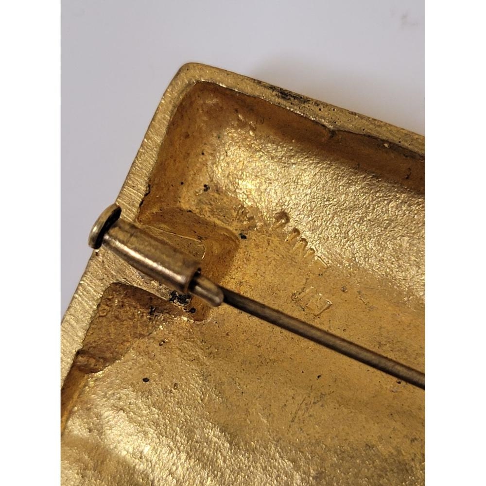 Line Vautrin | A ‘Petit Poucet’ brooch in gilded bronze. Partially ...