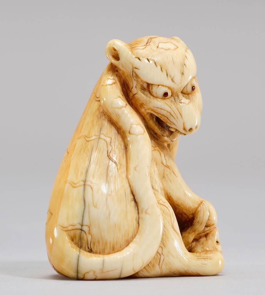 Japanese School, 19th Century | A NETSUKE OF A TIGER WITH A LITTLE ...