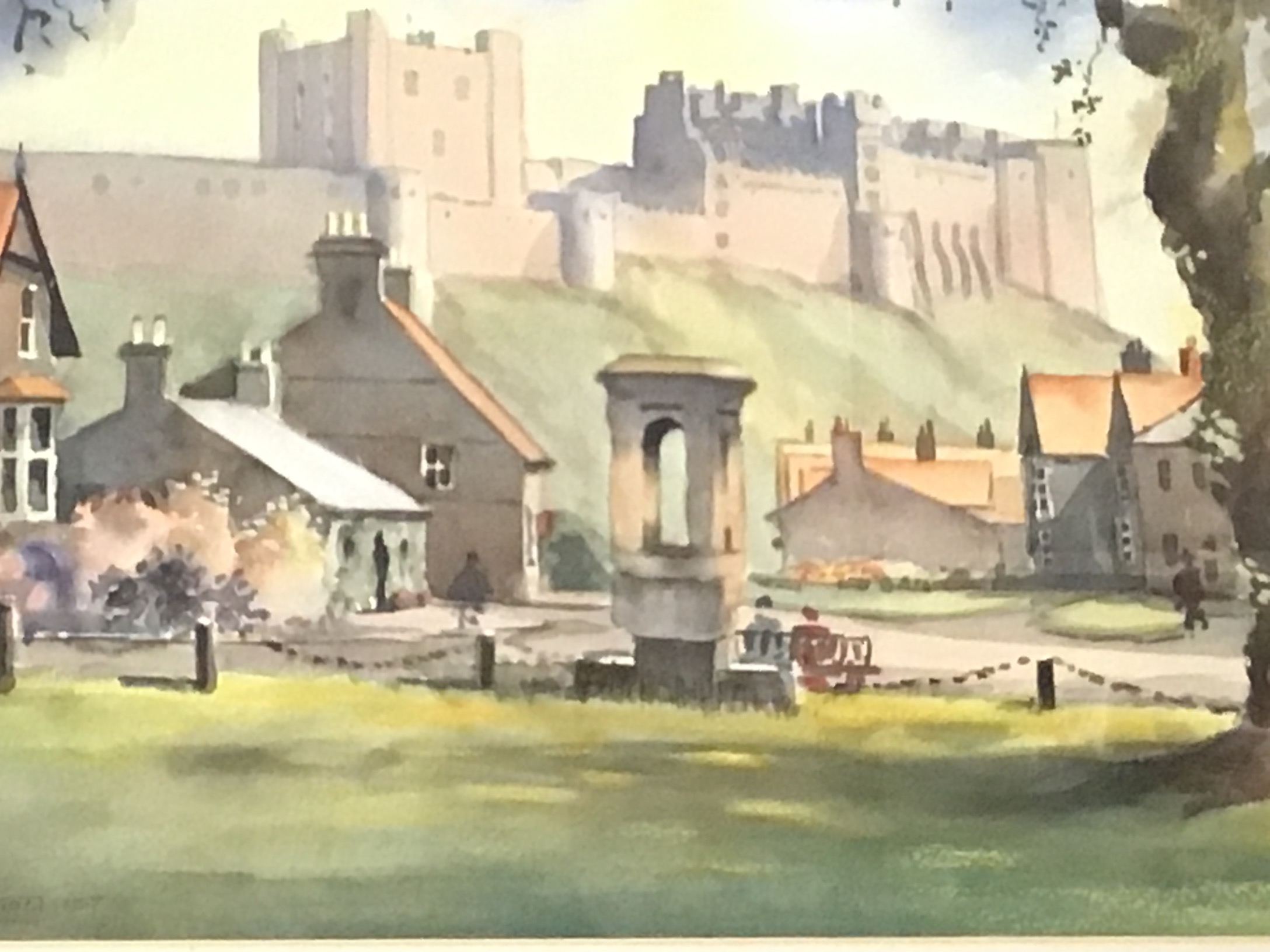 Fred Stott | Bamburgh village beneath castle with figures | MutualArt