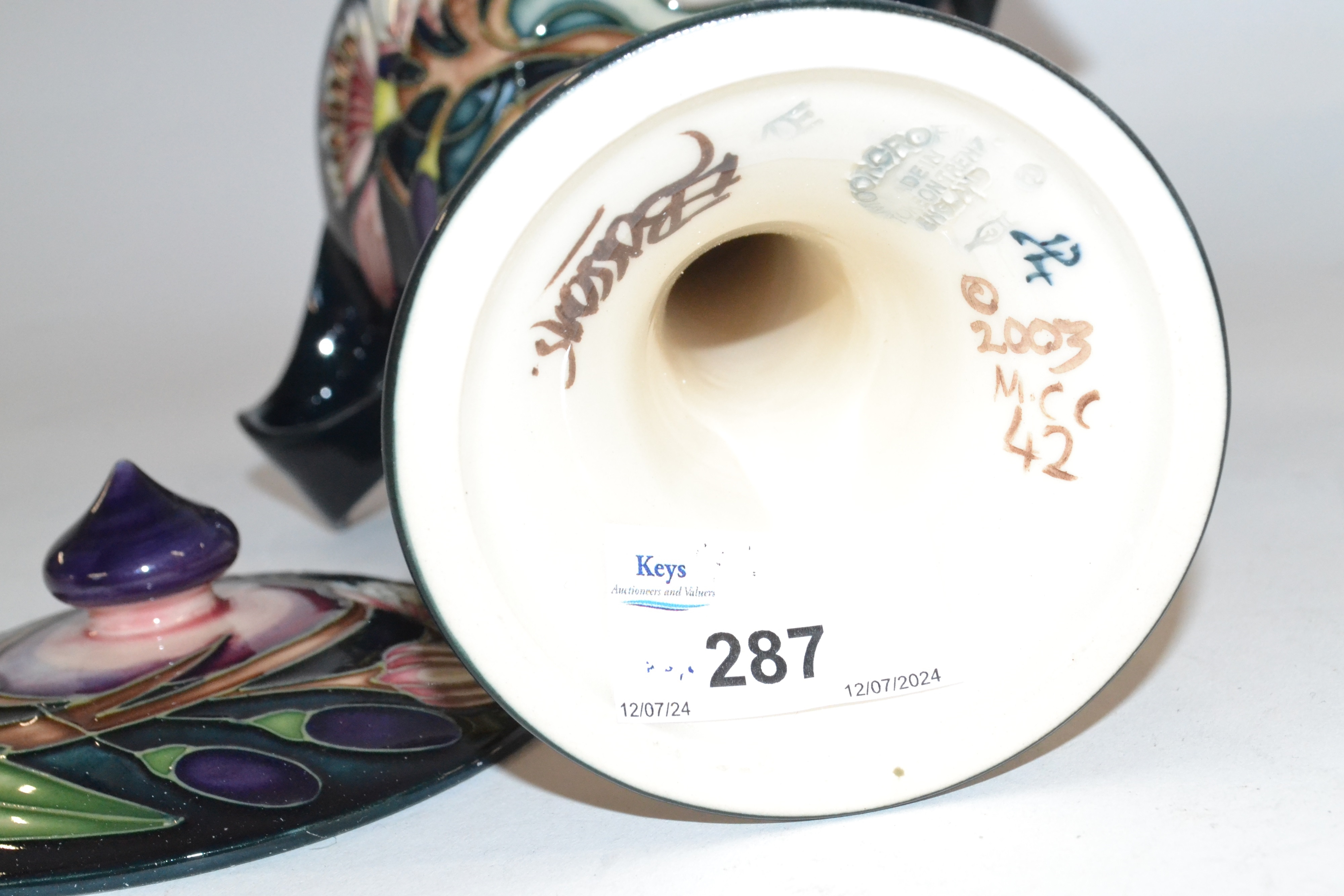 Emma Bossons | A Moorcroft vase and cover in florian style with a tube ...
