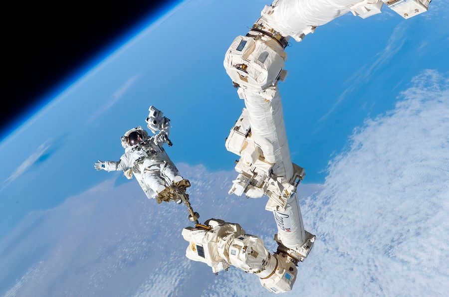 NASA | Impressive extravehicular activity (EVA) showing astronaut ...
