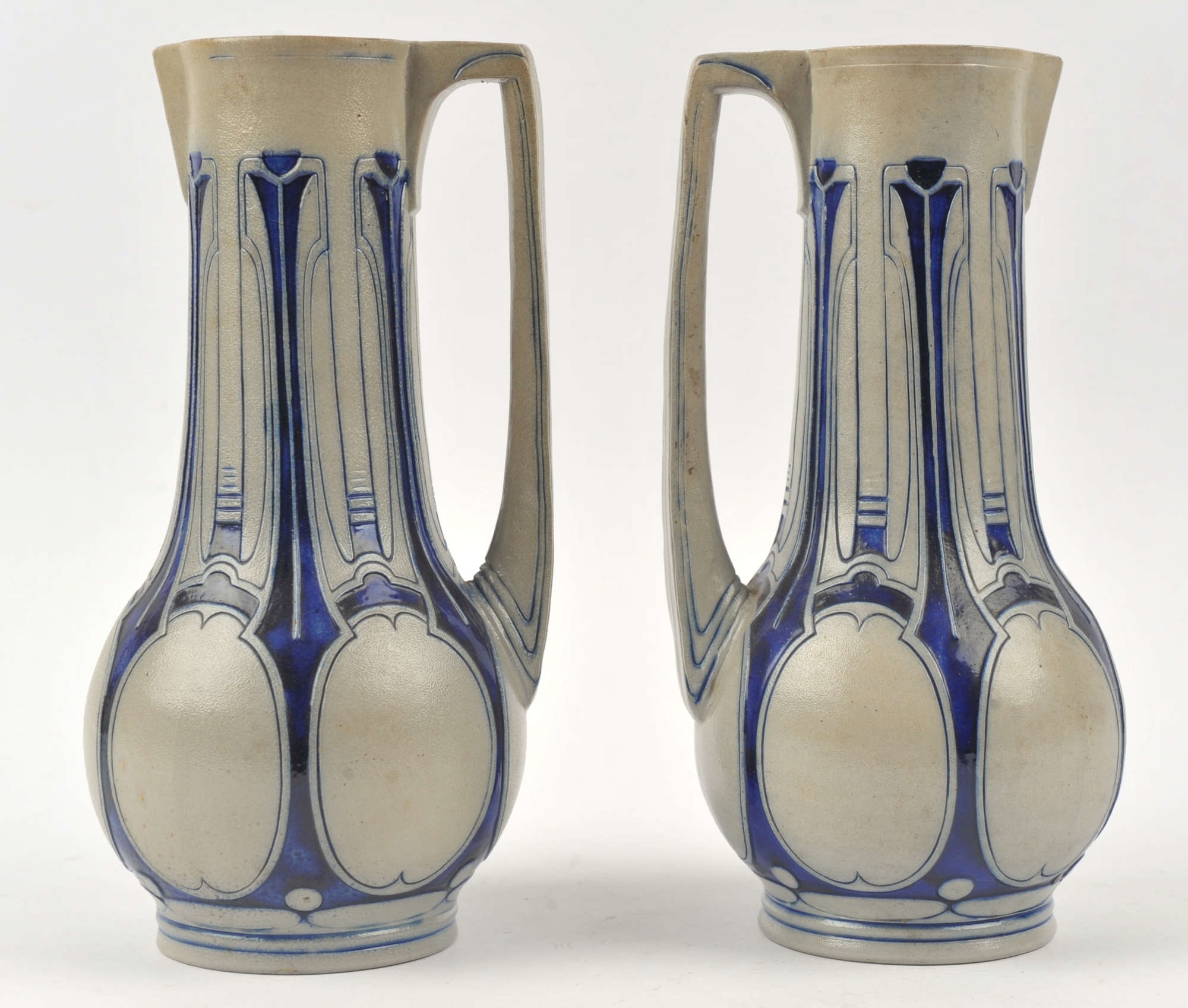 Peter Behrens | two Jugendstil salt glazed stoneware ewers (Early 20th ...