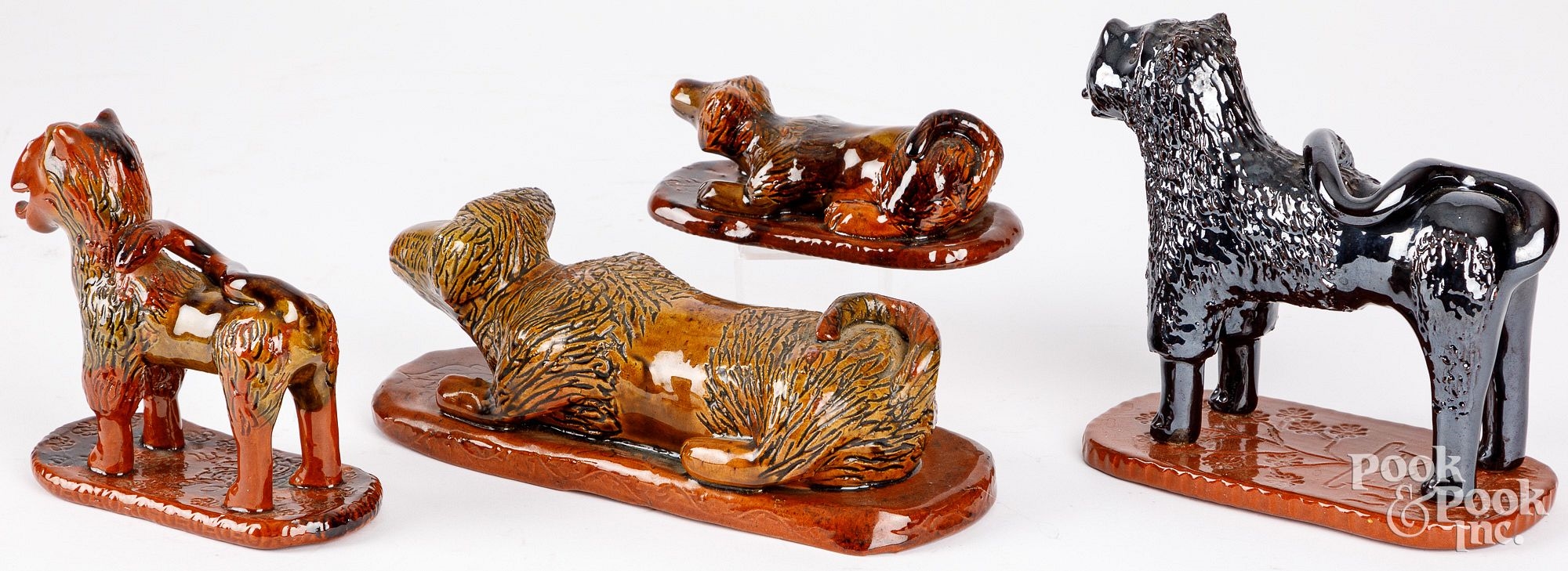 Lester Breininger | Four Lester Breininger redware dogs (1976) | MutualArt
